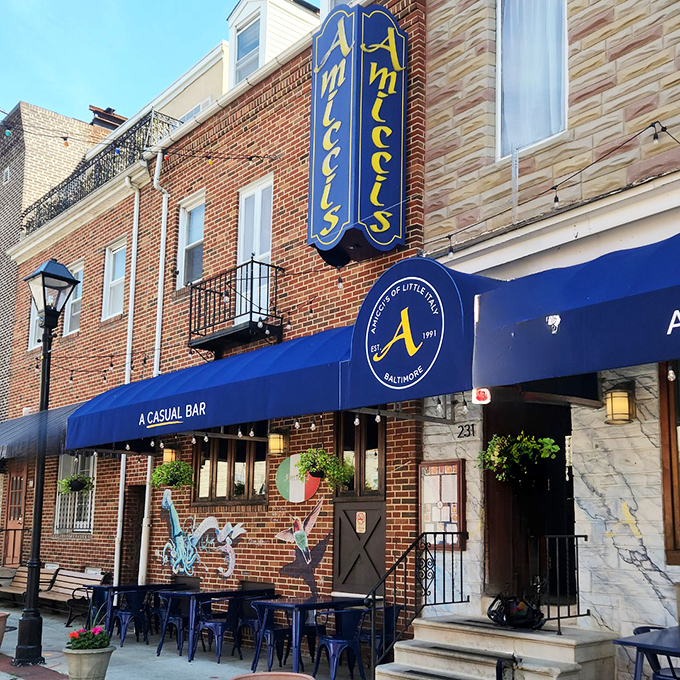 The distinctive blue and gold signage of Amicci's promises what every food lover craves – exceptional Italian cuisine without the fuss or pretension.