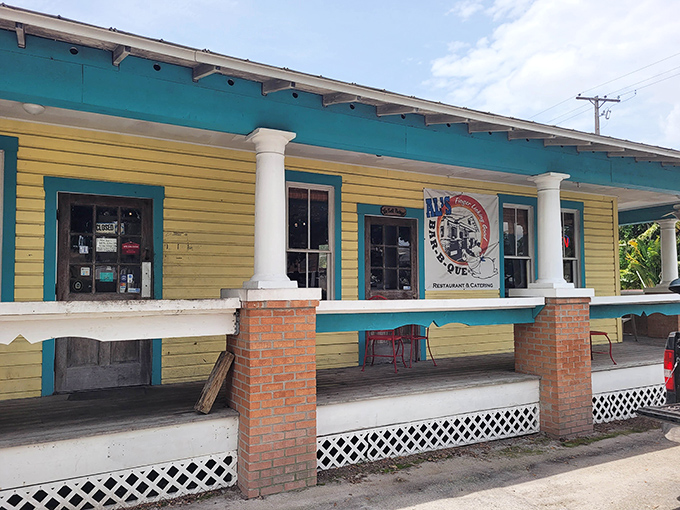 The cheerful yellow exterior with turquoise trim isn't just eye-catching&mdash;it's a beacon calling hungry souls to barbecue salvation in Ybor City.