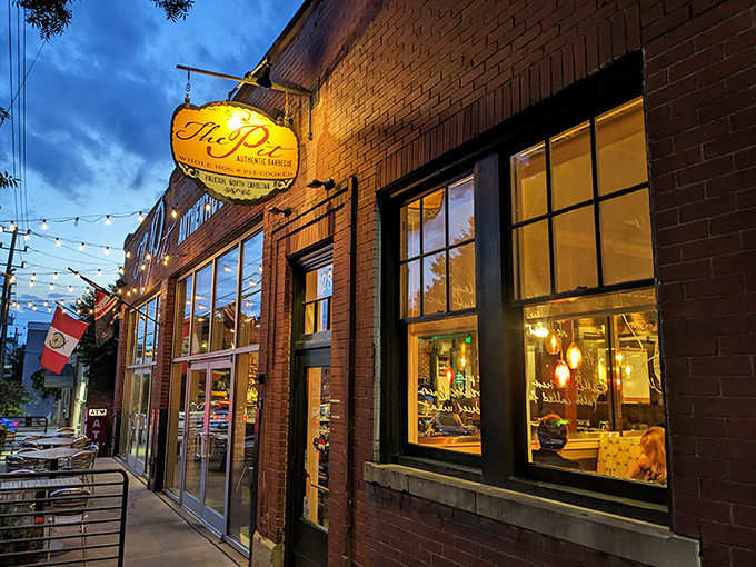 Evening light transforms this Raleigh landmark into a beacon for barbecue believers seeking their nightly meat meditation.