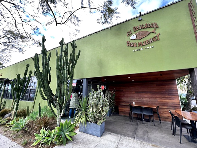 The mint-green exterior with towering cacti isn't trying to impress anyone&mdash;it's saving all that energy for what's happening inside.