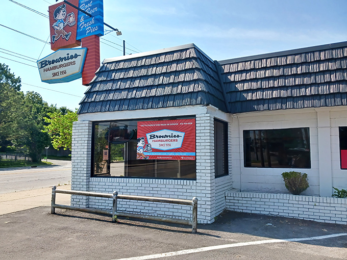 That vintage cartoon character on the sign isn't just cute nostalgia&mdash;he's promising you the meal that might just ruin all other burgers forever.