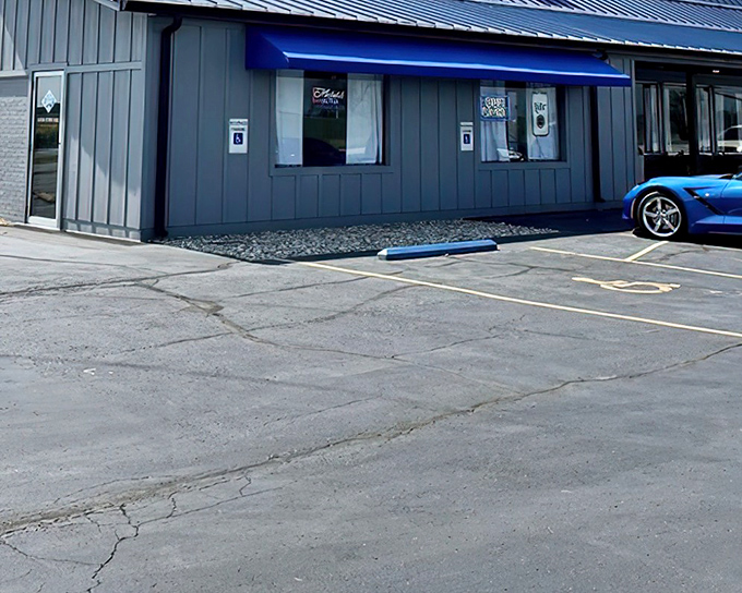 The unassuming blue awning beckons like a secret handshake. This modest exterior hides Highland's greatest culinary treasure, proving books and restaurants should never be judged by their covers.
