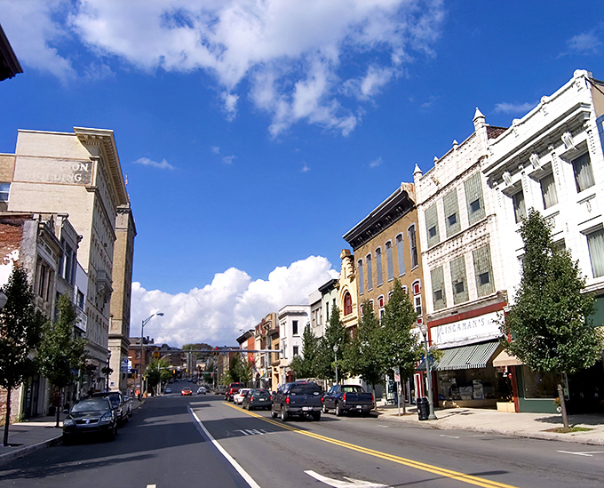 Downtown Pottsville greets visitors with its classic Main Street charm, where historic architecture meets small-town hospitality under Pennsylvania's brilliant blue skies.