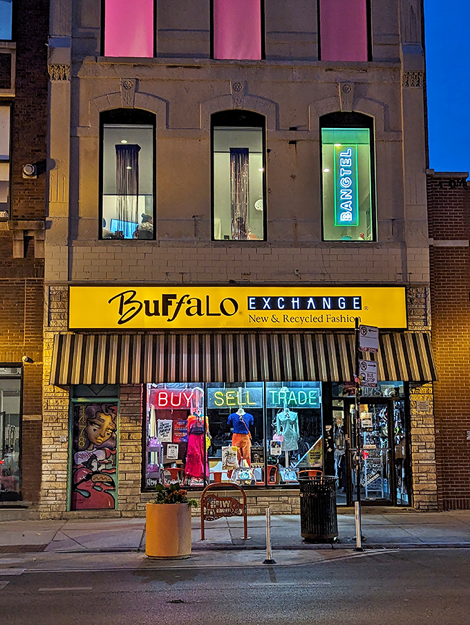 The iconic yellow storefront of Buffalo Exchange glows like a fashion beacon on Milwaukee Avenue, beckoning treasure hunters with its colorful "Buy, Sell, Trade" promise.