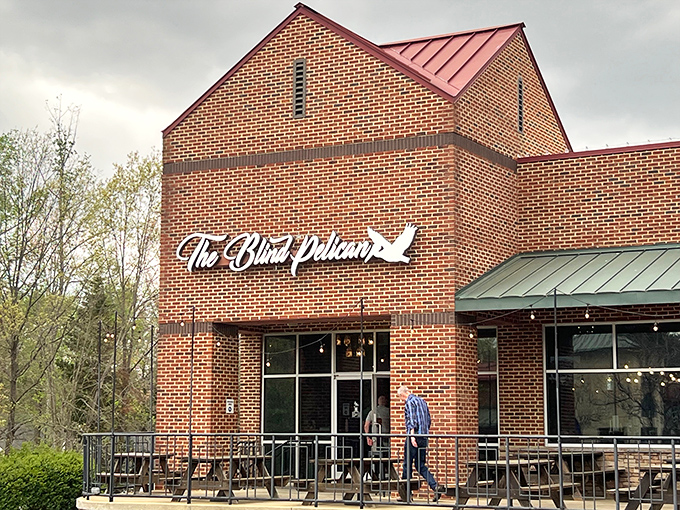 The brick fortress of flavor that is The Blind Pelican stands proudly in Holly Springs, promising seafood treasures within its unassuming walls.