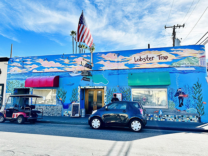 The Lobster Trap's vibrant blue exterior is like finding a mermaid's hideout on dry land. That American flag isn't just patriotic&mdash;it's signaling "seafood independence" from ordinary meals.