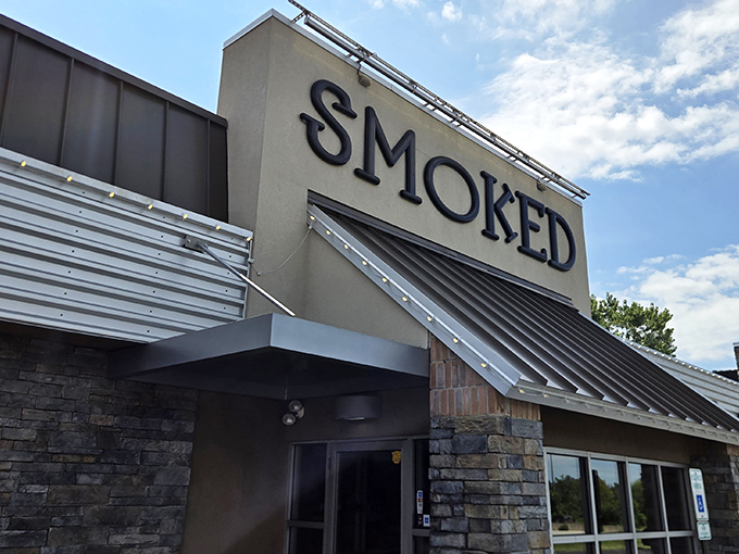 Even at sunset, Smoked's welcoming facade glows with promise &ndash; like a barbecue lighthouse guiding hungry travelers to safe, delicious harbor.