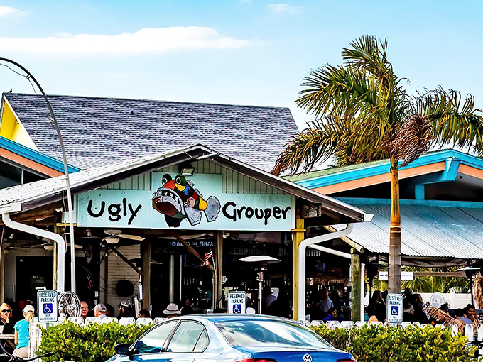 The cheerful turquoise facade of The Ugly Grouper welcomes you like an old friend who happens to make the best fish in town.