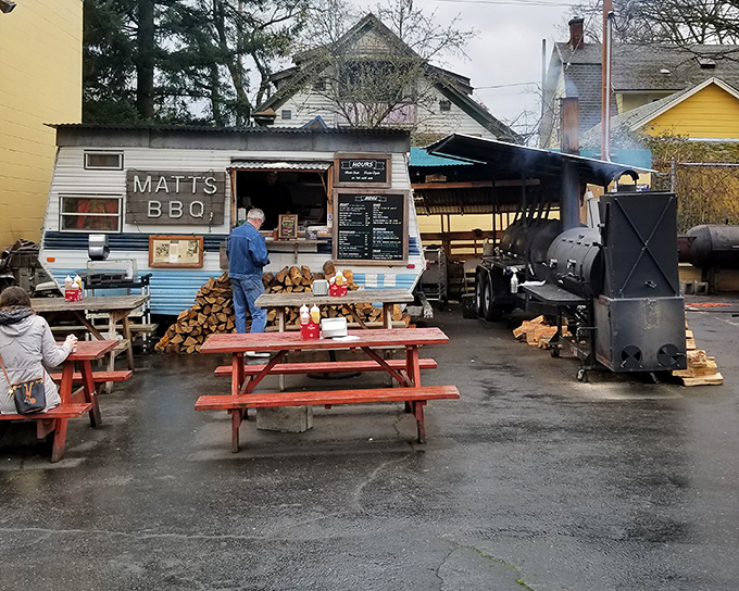 The blue trailer that launched a thousand BBQ pilgrimages. Matt's BBQ stands proudly in Portland, where smoke signals announce serious Texas-style goodness.