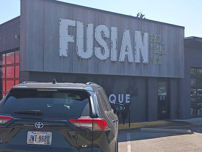 The unassuming exterior of Ray Ray's might still bear its "FUSIAN" past, but don't be fooled&mdash;barbecue magic happens here.