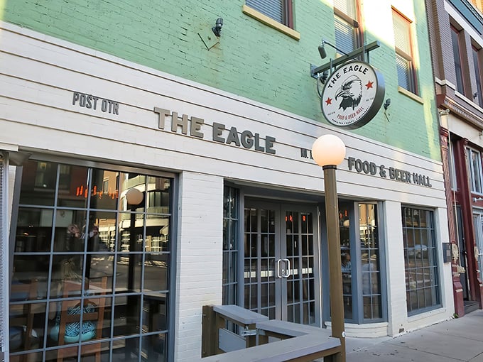 The mint-green facade of The Eagle OTR stands out on Vine Street like a beacon for fried chicken pilgrims. Cincinnati's historic architecture provides the perfect backdrop for culinary magic.