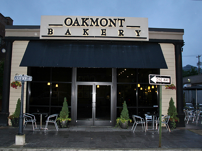 The classic storefront beckons like an old friend, promising sweet reunions under that iconic black awning. Oakmont's exterior is both invitation and promise.