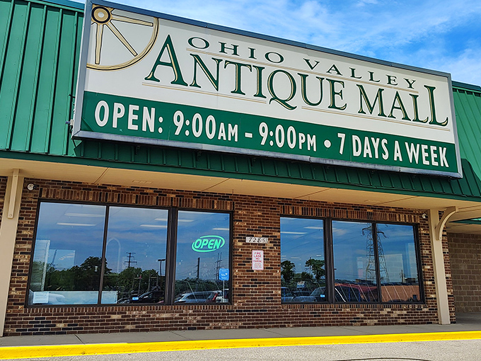 The green-trimmed facade of Ohio Valley Antique Mall beckons like a siren song to treasure hunters. Open daily from 9-9, because nostalgia doesn't keep regular business hours.