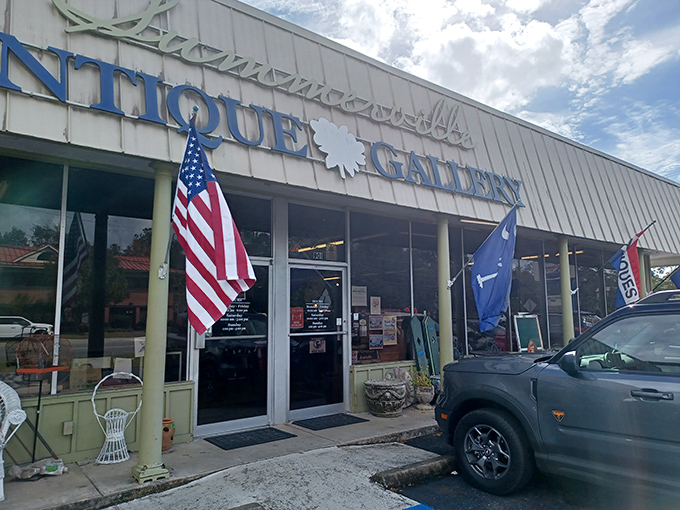 The unassuming exterior of Summerville Antique Gallery belies the treasure trove within. Like a time-travel portal disguised as a storefront, it beckons with promises of discovery.
