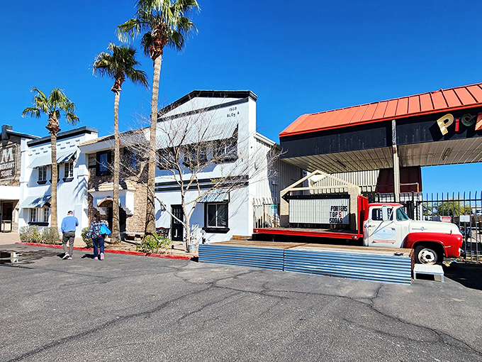 Palm trees and desert sunshine frame this side view of Merchant Square, where Arizona's largest collection of vintage treasures awaits discovery.