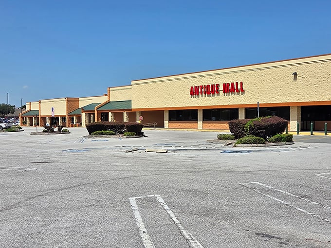 The unassuming exterior of Florida's Antique Mall in Inverness belies the treasure trove waiting inside. Like a time-travel portal disguised as a strip mall storefront.
