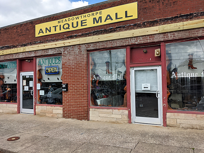 The unassuming brick facade of Meadowthorpe Antique Mall hides a universe of treasures within. Like a time-travel portal disguised as a storefront.