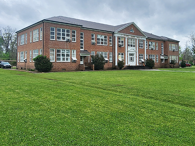 The stately brick exterior of Washington Old Schoolhouse stands as a monument to education's past, now housing treasures instead of textbooks.