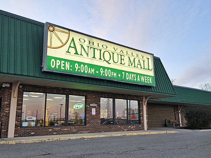 The iconic green-roofed entrance to Ohio Valley Antique Mall stands ready to welcome treasure hunters seven days a week, like a portal to the past waiting to be explored.