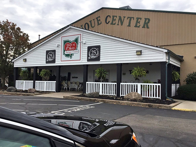 The welcoming front porch of Heart of Ohio Antique Center beckons treasure hunters with its lush greenery and charming white railings &ndash; like Grandma's house, if Grandma collected everything.