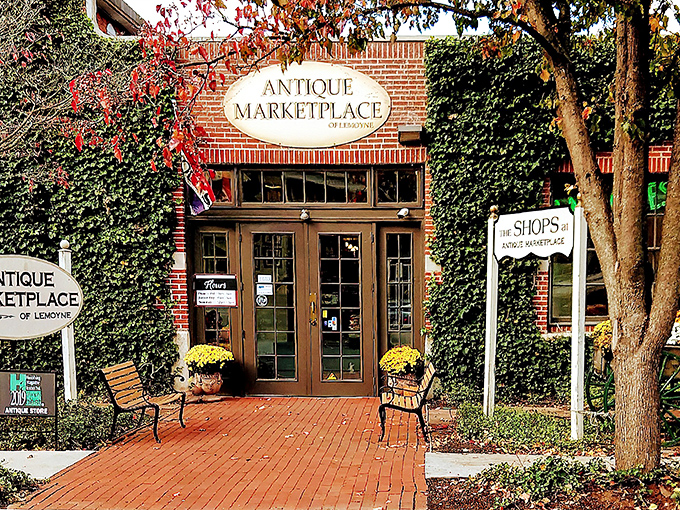 Ivy embraces brick like time hugging history at this charming marketplace entrance. Yellow mums stand guard, welcoming treasure hunters to Pennsylvania's paradise of yesteryear.