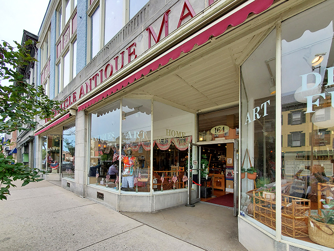 The iconic red awning of Carlisle Antique Mall beckons treasure hunters like a lighthouse for the nostalgically inclined.