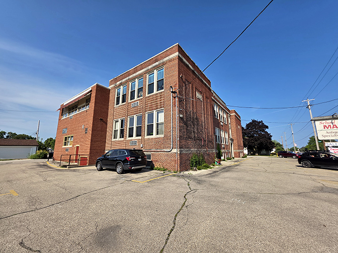 The iconic brick schoolhouse exterior stands proudly against the Wisconsin sky, promising educational adventures of an entirely different kind.