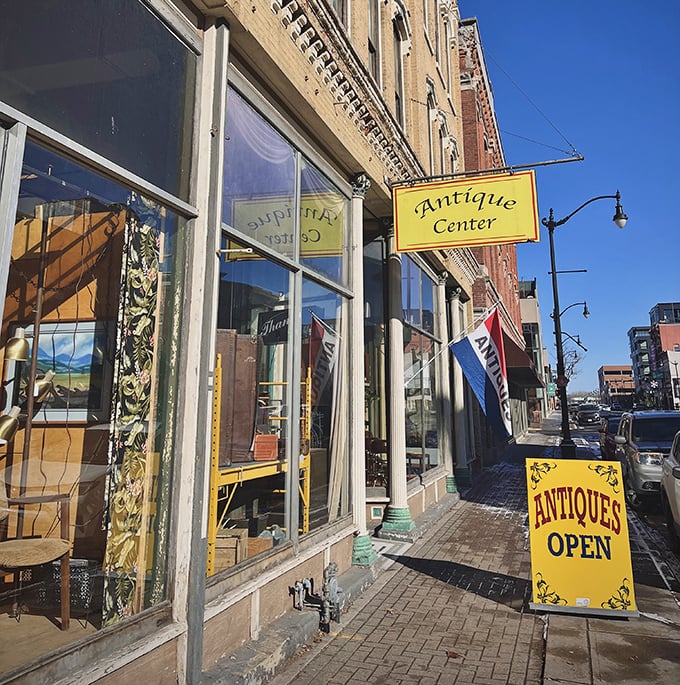 The iconic yellow sign beckons like a lighthouse for treasure hunters. Downtown La Crosse's historic brick fa&ccedil;ade hints at the wonders waiting inside.