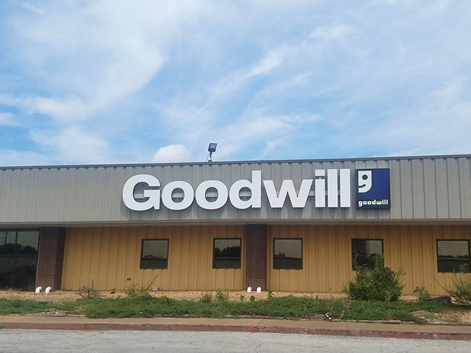 The unassuming exterior hides a treasure trove where bargain hunters gather like archaeologists at a promising dig site.