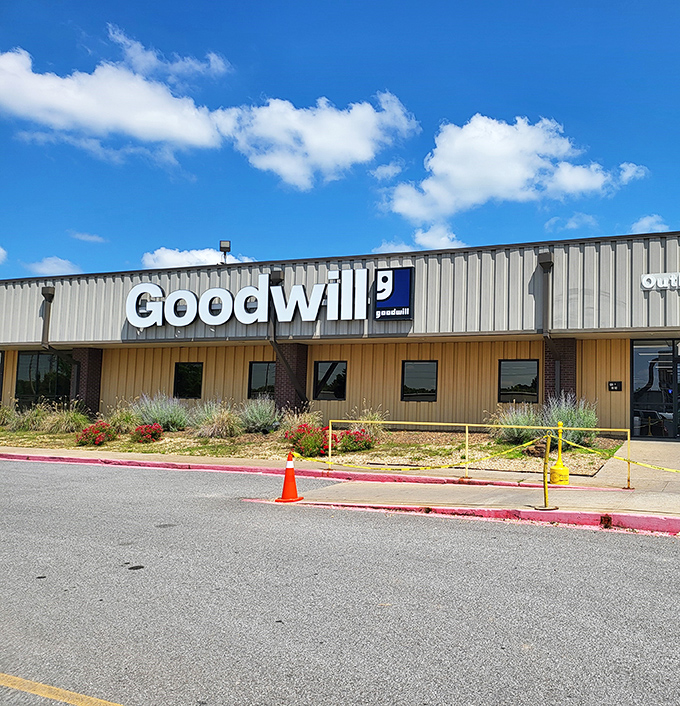 The unassuming exterior hides a treasure trove where bargain hunters gather like archaeologists at a promising dig site.