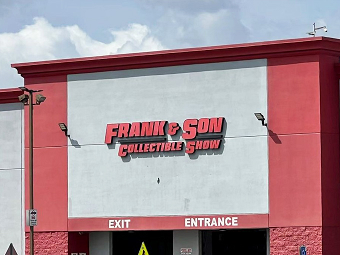 The red and white exterior of Frank & Son stands like a portal to another dimension—one where your childhood treasures never disappeared.