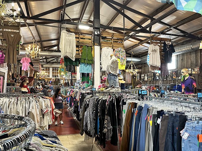 Racks upon racks of fashion treasures await under rustic wooden beams, where yesterday's styles become tomorrow's statement pieces.