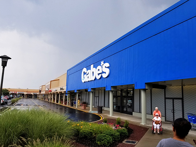 The unmistakable blue facade of Gabe's stands like a beacon for bargain hunters, promising treasure within those unassuming walls.