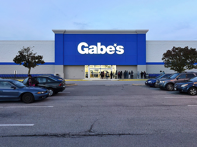 The iconic blue facade of Gabe's in Bear stands like a retail lighthouse, beckoning bargain hunters from across Delaware with promises of treasures within.