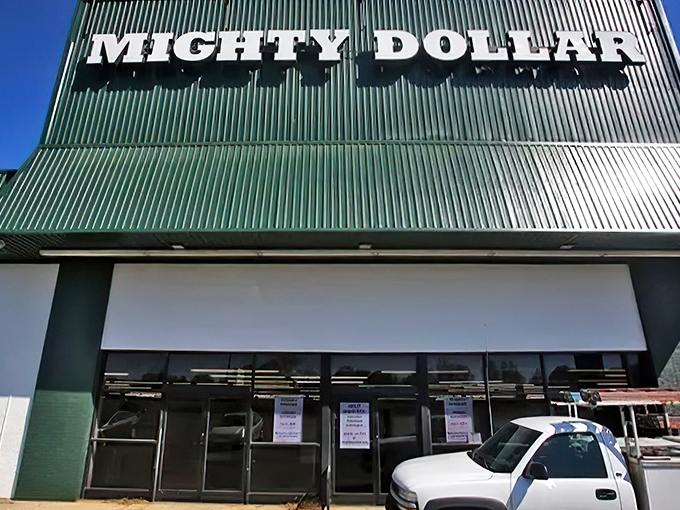 The iconic green-roofed Mighty Dollar stands like a beacon of bargain hope on East Dixon Boulevard in Shelby, promising treasures that won't empty your wallet.
