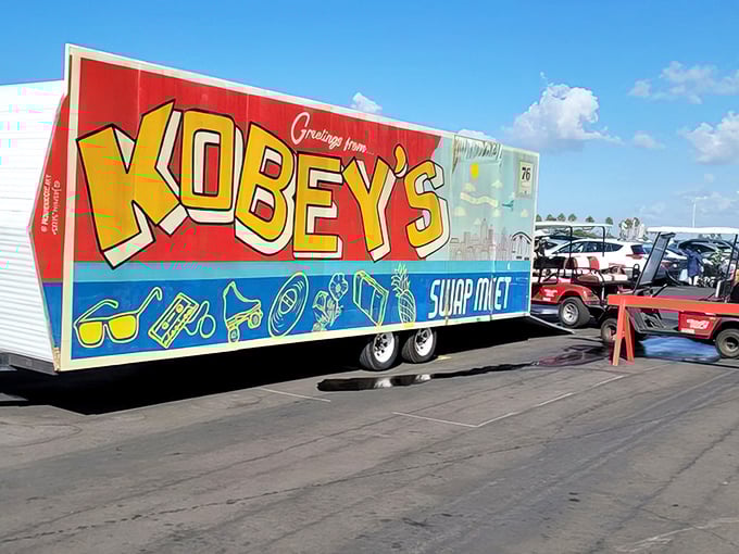 A colorful trailer emblazoned with "Greetings from KOBEY'S" serves as a mobile billboard for this San Diego institution, complete with illustrations of potential finds.