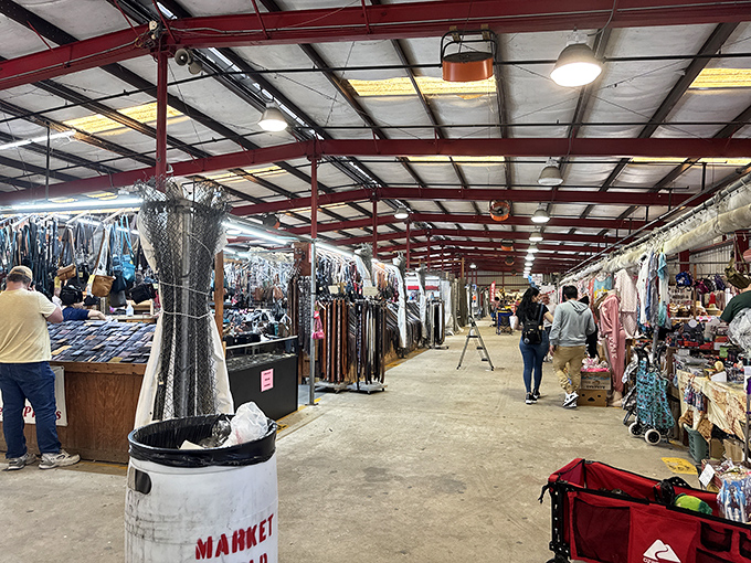 The indoor market corridors stretch like an endless runway of possibilities, where shoppers become explorers and every booth promises a new discovery.