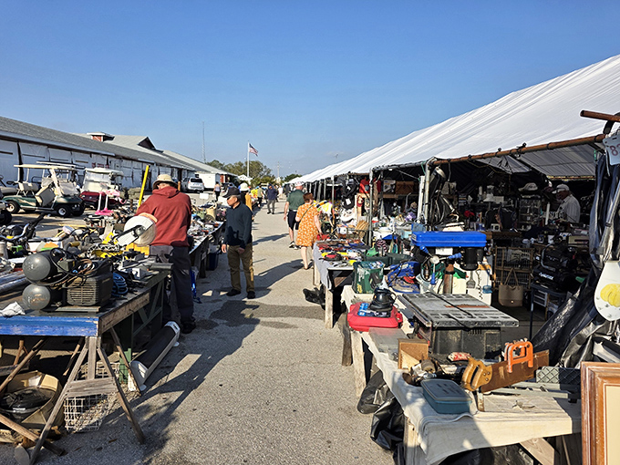 The treasure hunter's paradise awaits! Red Barn's outdoor vendors offer everything from power tools to peculiar trinkets under Florida's brilliant blue skies.