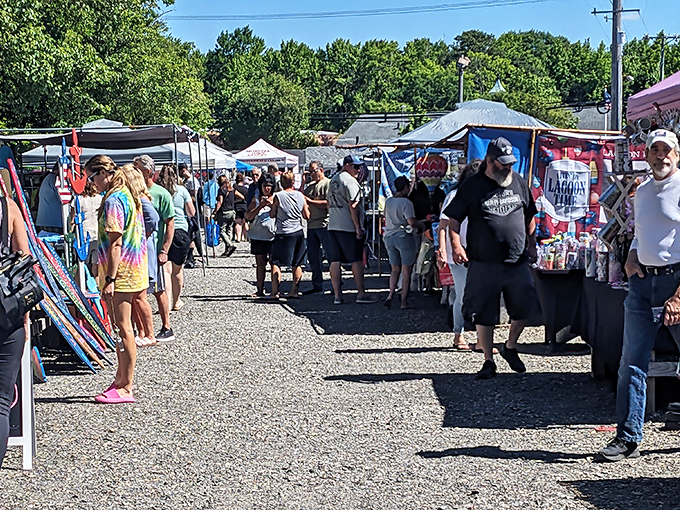 Treasure hunters navigate the gravel pathways between vendor tents, where one person's castoffs become another's prized discoveries. Weekend quests begin here!