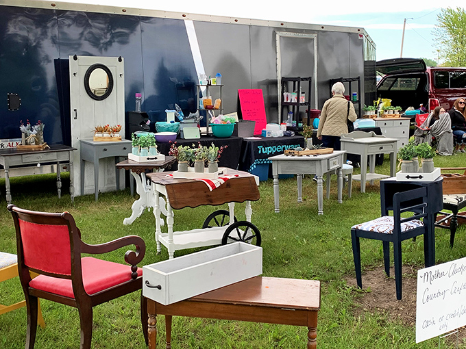 Furniture finds that tell stories&mdash;shabby chic tables, vintage chairs, and planters arranged like a living room under the open sky.