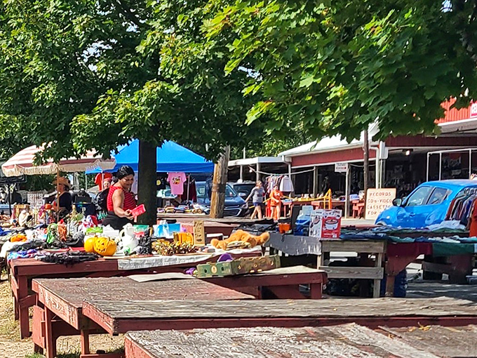 The red barn facade promises treasures within, like a rustic Amazon warehouse run by folks who actually smile.
