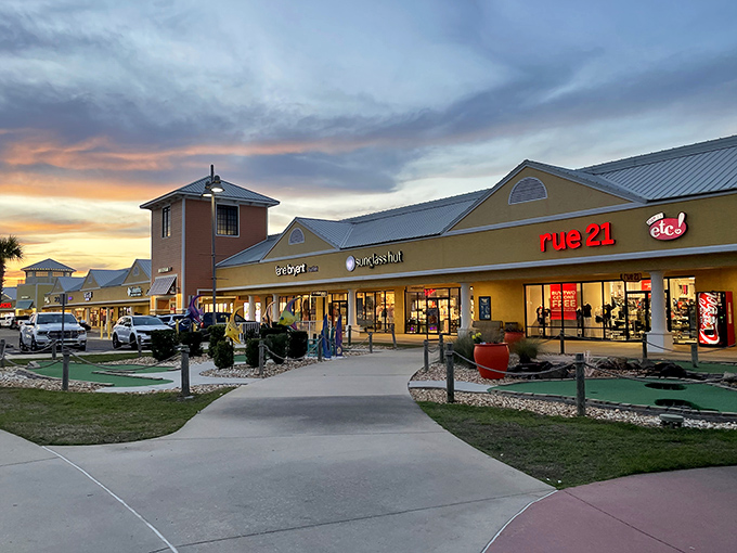 The golden-hour glow transforms Tanger Outlets Foley into a shopper's paradise, where retail therapy meets coastal charm under Alabama's painted sky.