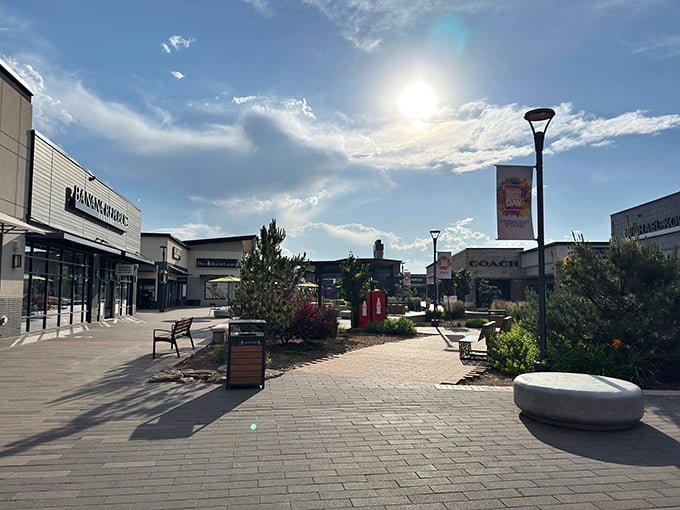 Blue skies and bargains await at Denver Premium Outlets, where Colorado's crisp mountain air somehow makes discount shopping feel virtuous.