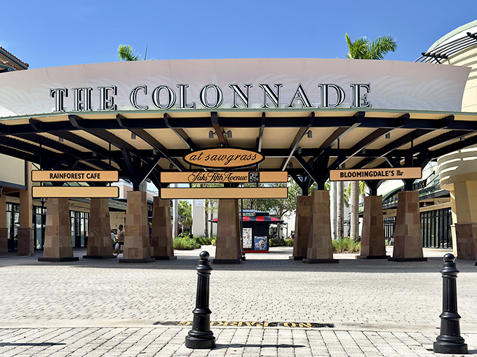 The grand entrance to retail therapy paradise, where your shopping dreams and budget nightmares collide under Florida sunshine.