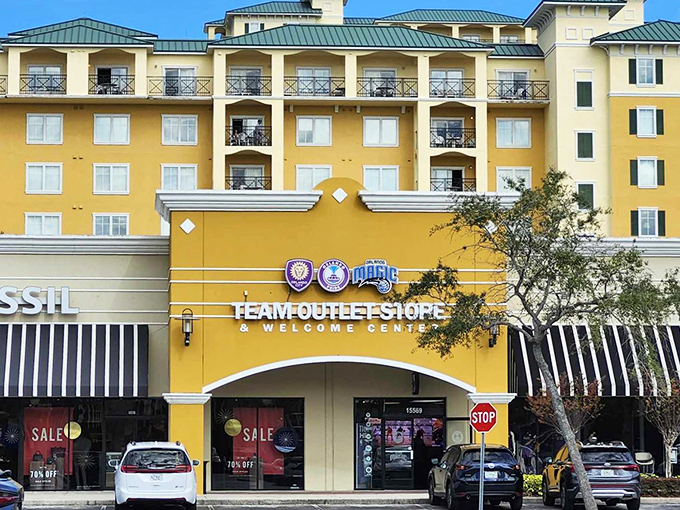 This vibrant yellow welcome center beckons shoppers like a sunbeam in a sea of Orlando attractions. No mouse ears required!