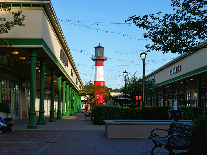 The iconic lighthouse centerpiece stands tall between shopping corridors, like a beacon guiding weary credit cards to their next destination.