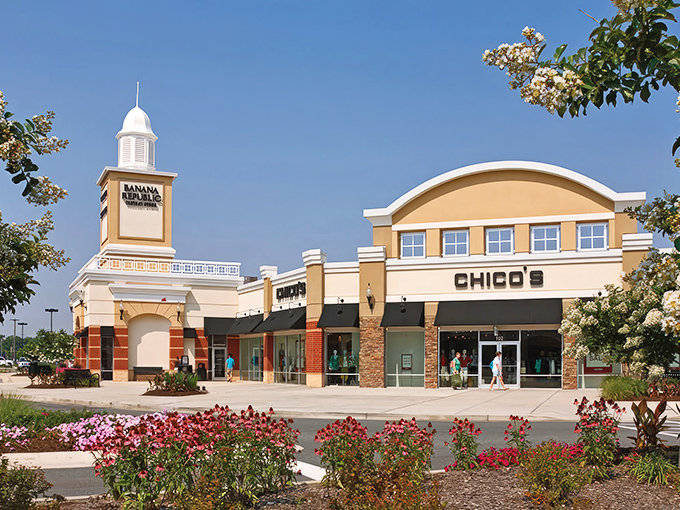 The iconic white cupola of Queenstown Premium Outlets stands like a retail lighthouse, beckoning shoppers to safe harbor&mdash;where wallets may not be so safe.
