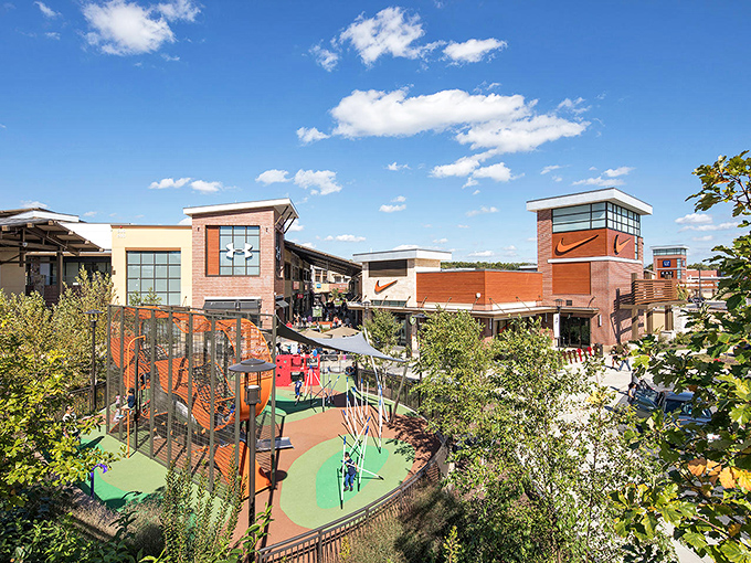 Blue skies and bargains await at Clarksburg Premium Outlets, where the playground and Nike tower stand as monuments to retail therapy done right.