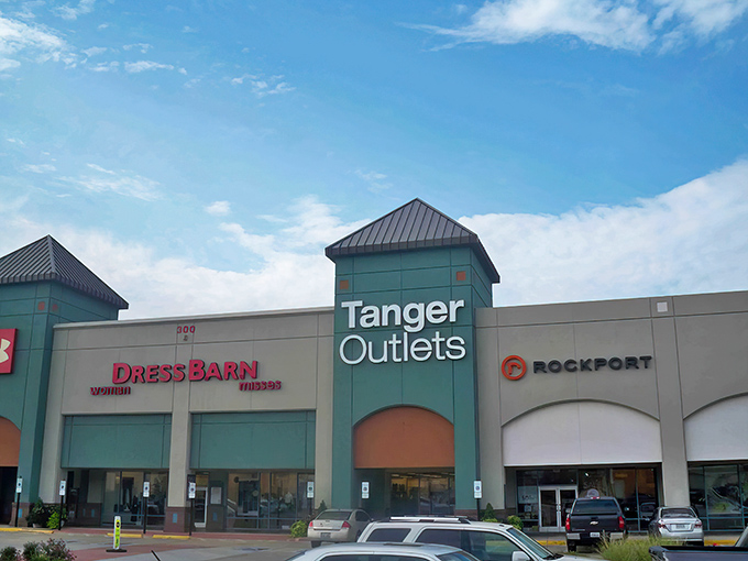 Teal towers and distinctive architecture announce you've arrived at the promised land of retail therapy. Dress Barn and Rockport stand ready for your shopping marathon.