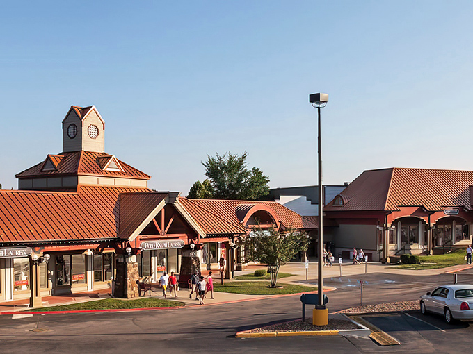 The distinctive copper roofs and rustic lodge-style architecture make this shopping paradise feel more like a mountain retreat than a bargain hunter's dream.